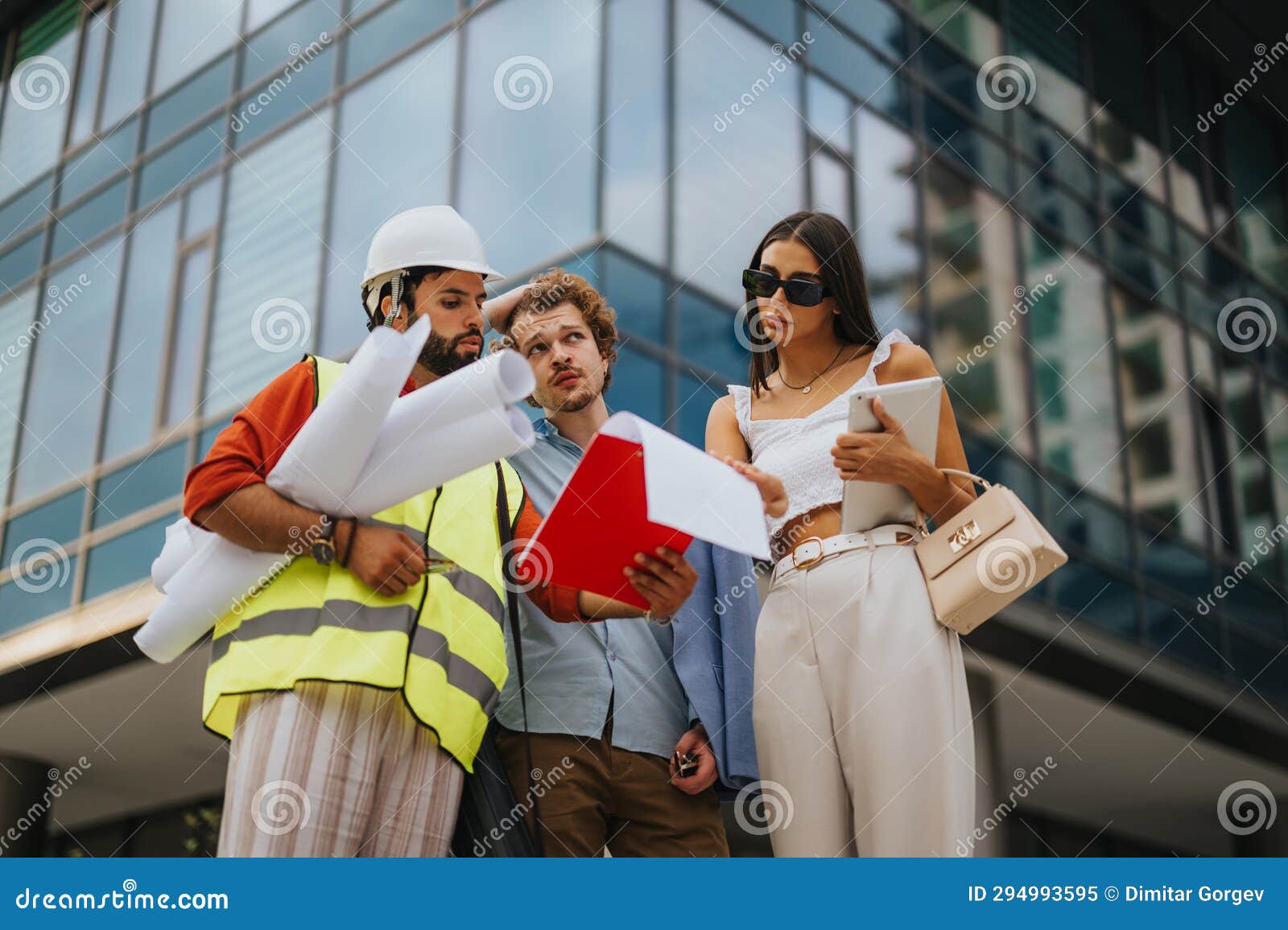 Architects and Engineers Discussing Project Details at Construction ...