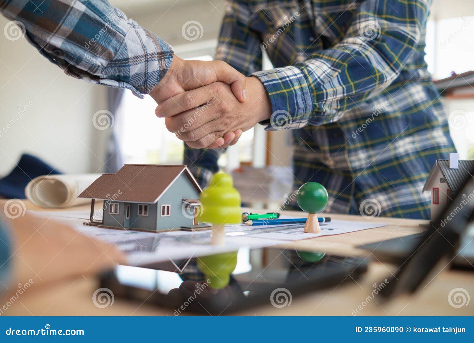 Architects and Engineers Join Hands To Congratulate when Discussing and ...