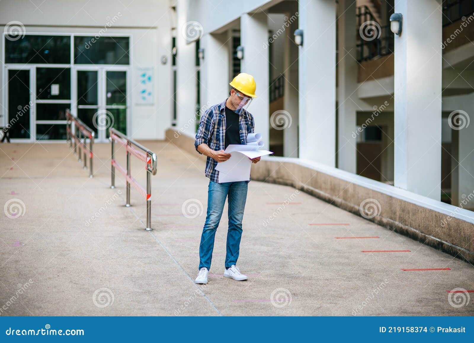 Architects Hold the Building Plan and Check the Work Stock Photo ...