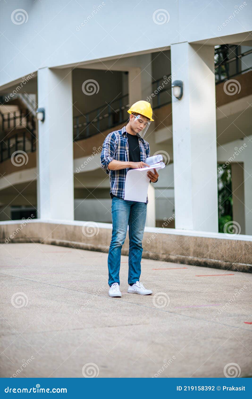 Architects Hold the Building Plan and Check the Work Stock Photo ...