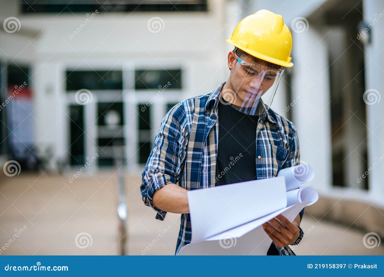 Architects Hold the Building Plan and Check the Work Stock Image ...