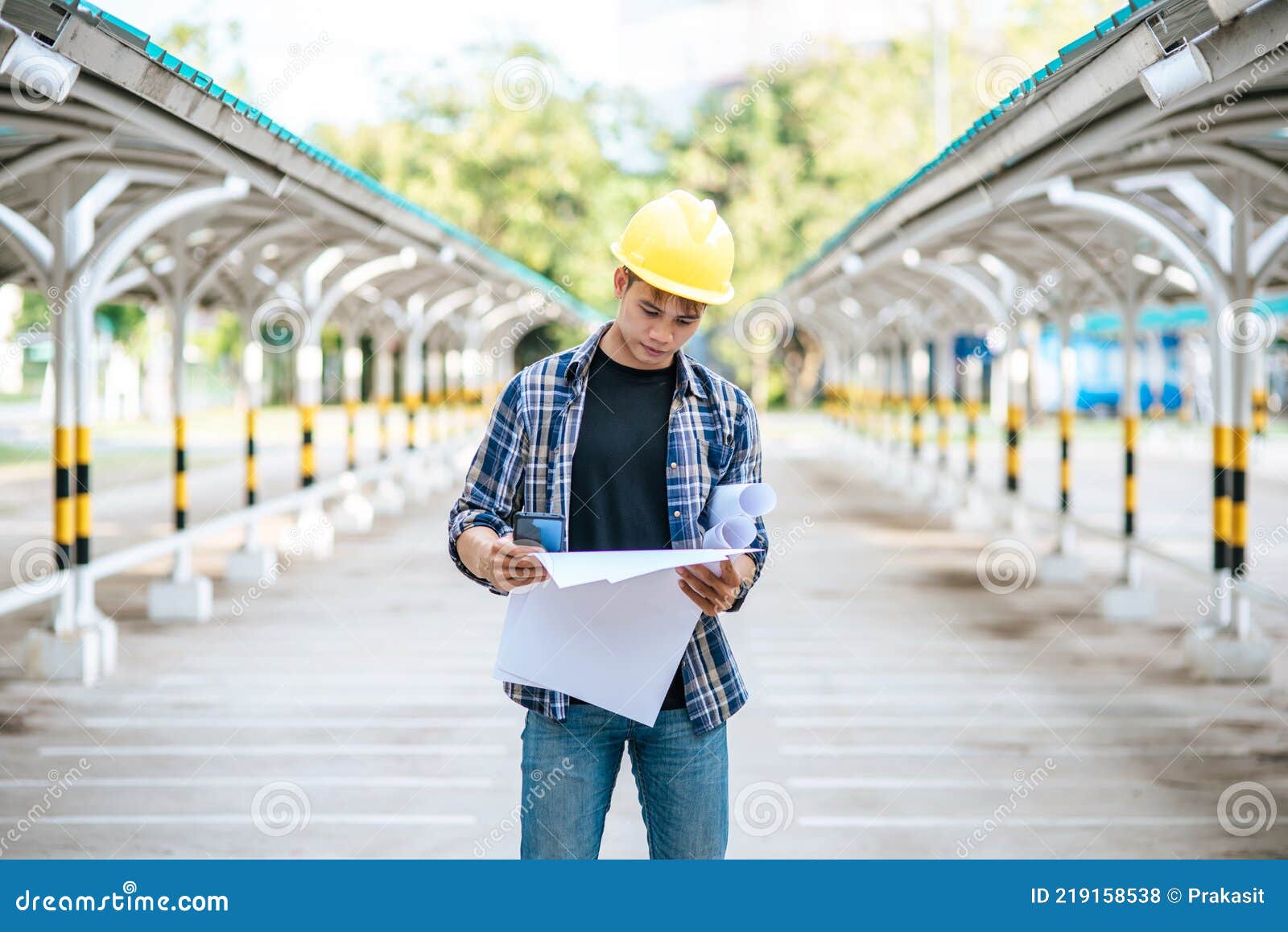 Architects Hold the Building Plan and Check the Work Stock Photo ...