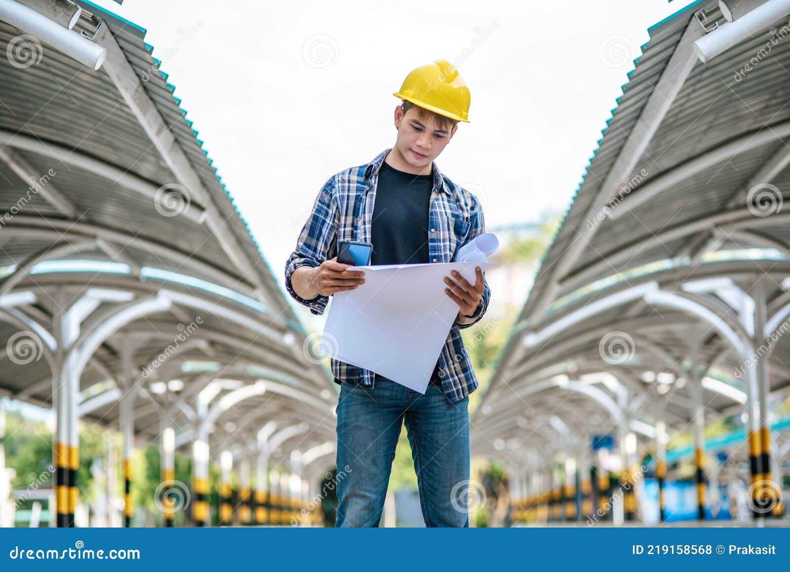 Architects Hold the Building Plan and Check the Work Stock Photo ...