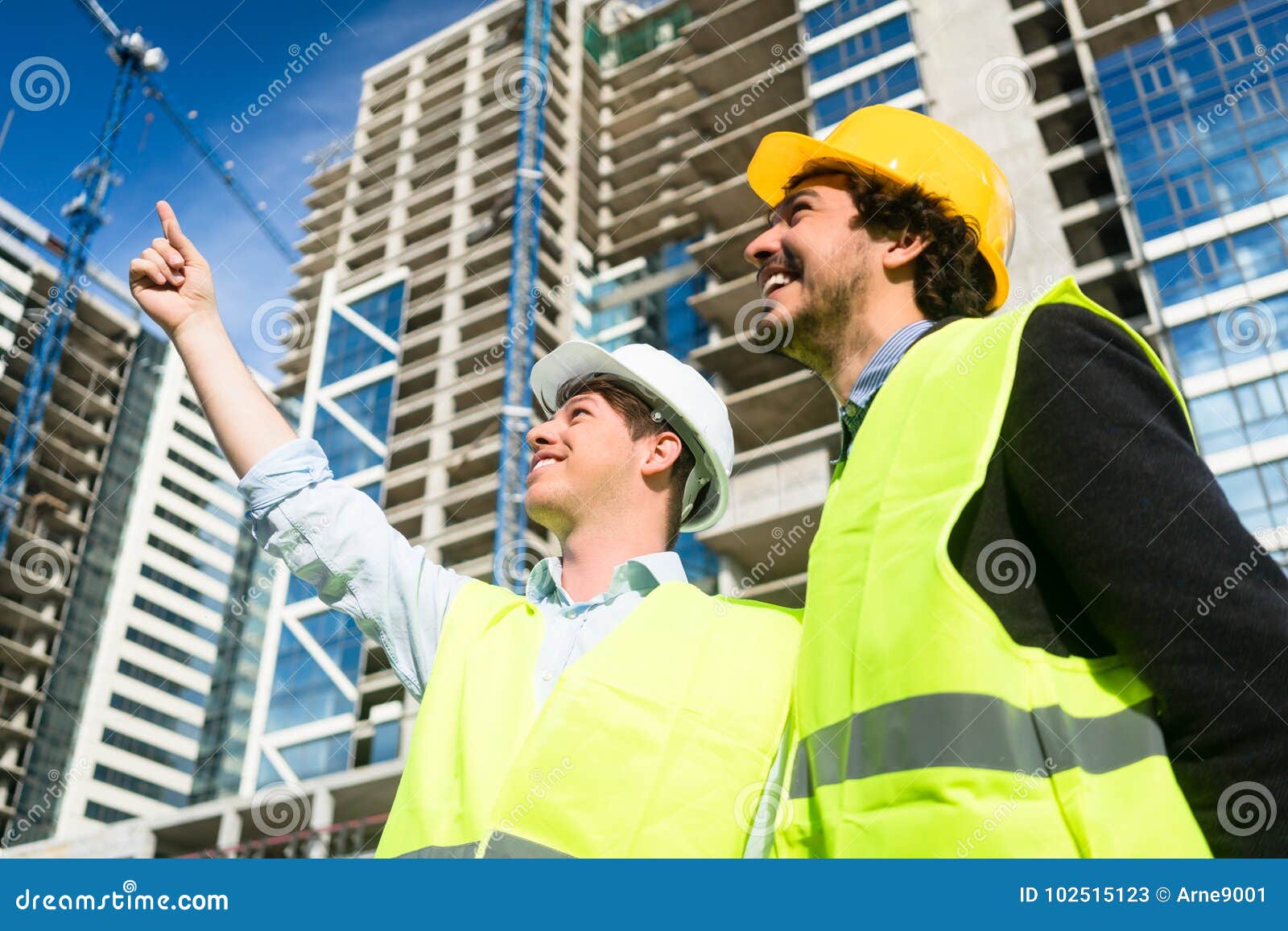 Architects on Large Construction Site Giving Instructions Stock Image ... Architects on Large Construction Site Giving Instructions Stock Image ...