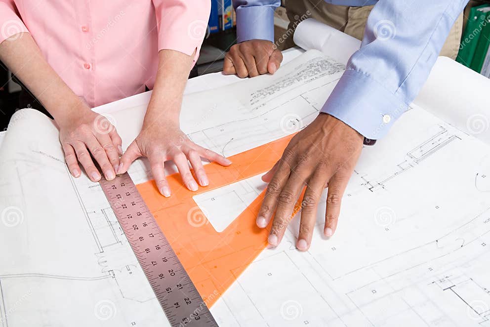 Architects Measuring Blueprint Stock Photo - Image of holding, accurate ...