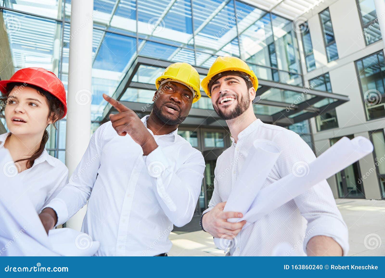 Architects in a Meeting of Construction Planning Stock Photo - Image of ...