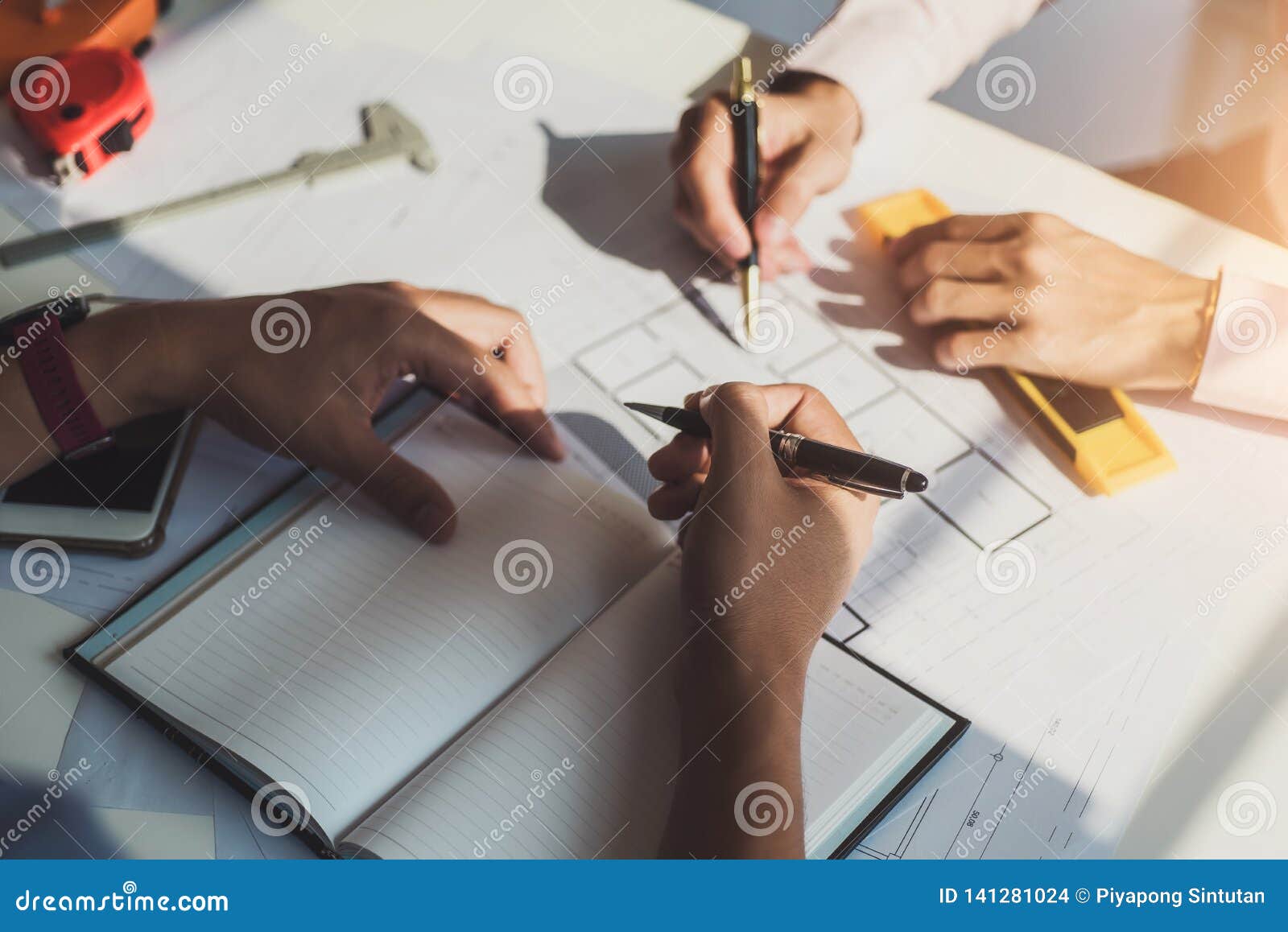Architects Meeting about Construction Project of House with Blueprints ... Architects Meeting about Construction Project of House with Blueprints ...