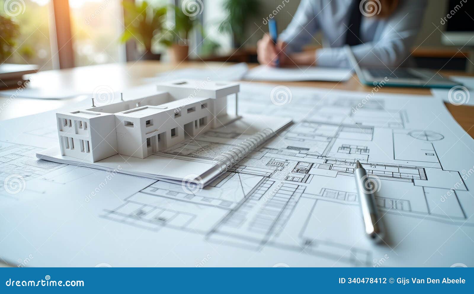 Architects Office with Detailed Blueprints and a Scale Model of a ...