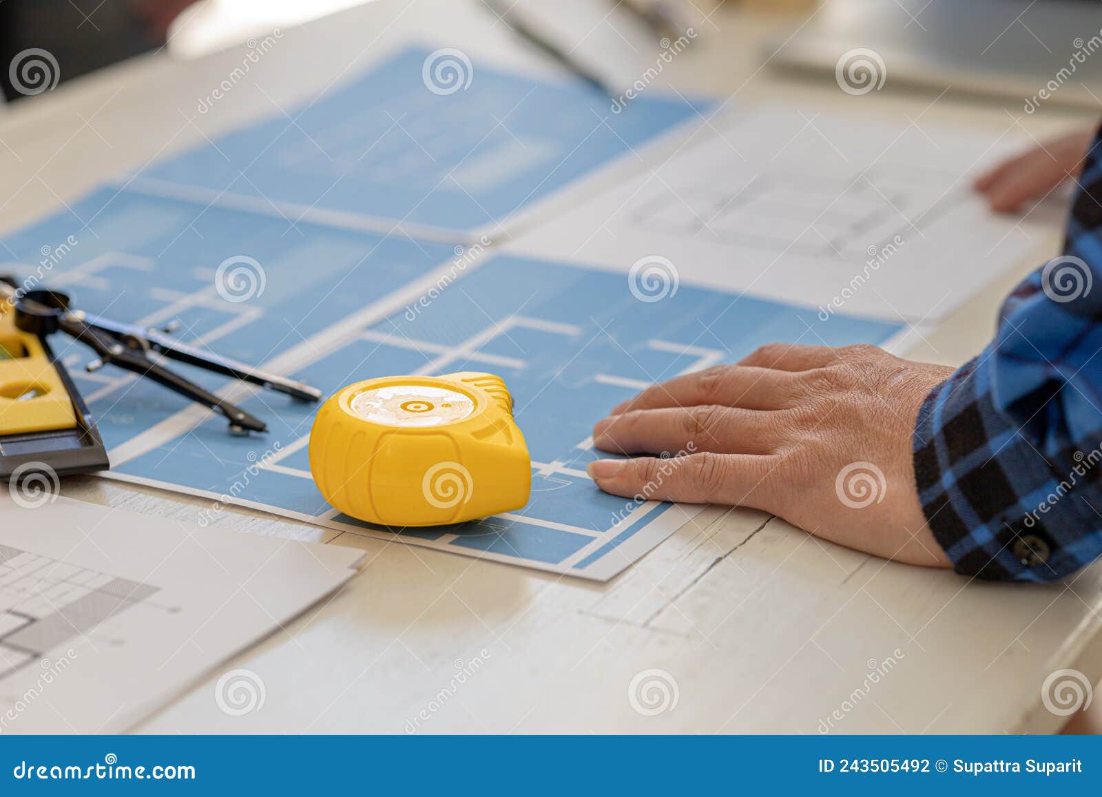 Architects are Reviewing Building Plans and Correcting Errors ...