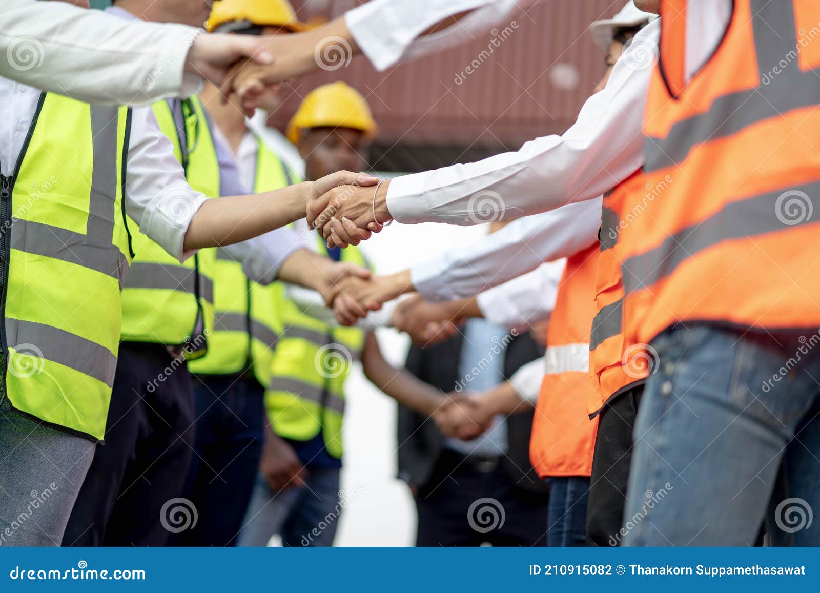 Architects Shaking Hands In Office Corridor Royalty-Free Stock ...