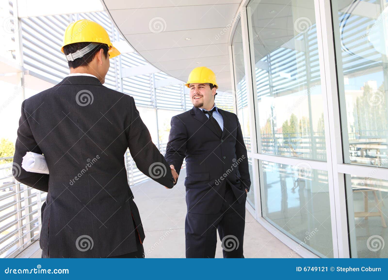 Architects Shaking Hands stock image. Image of foreman - 6749121