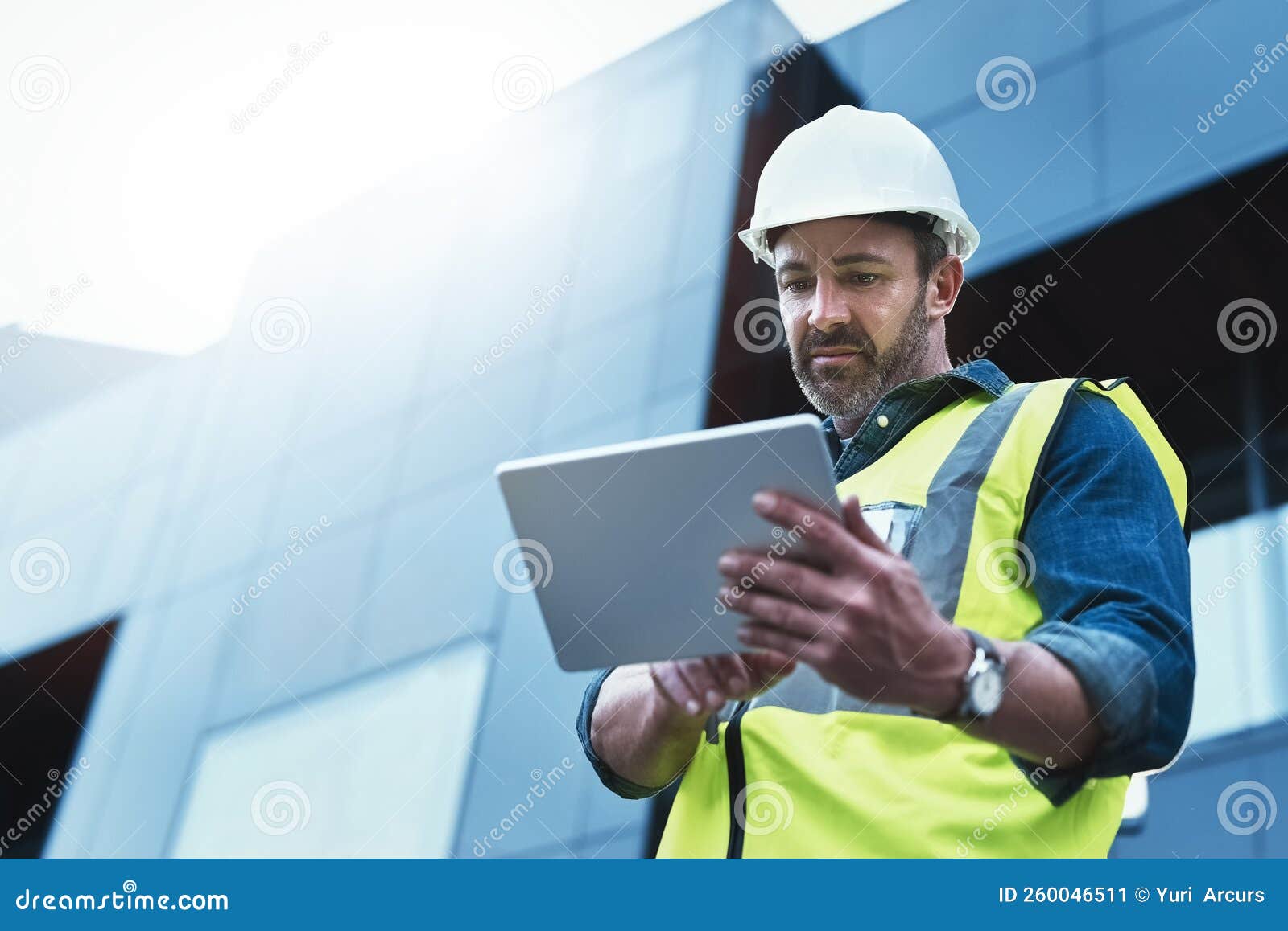 Architects Tend To Wear Many Different Hats. a Engineer Using a Digital ...