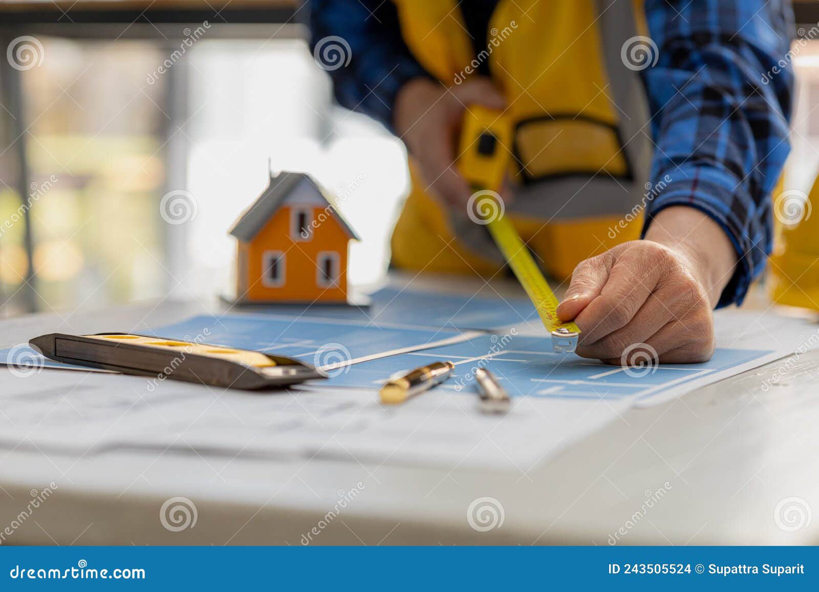 Architects are Using Tape Measure To Measure Building Plans, Architect ...