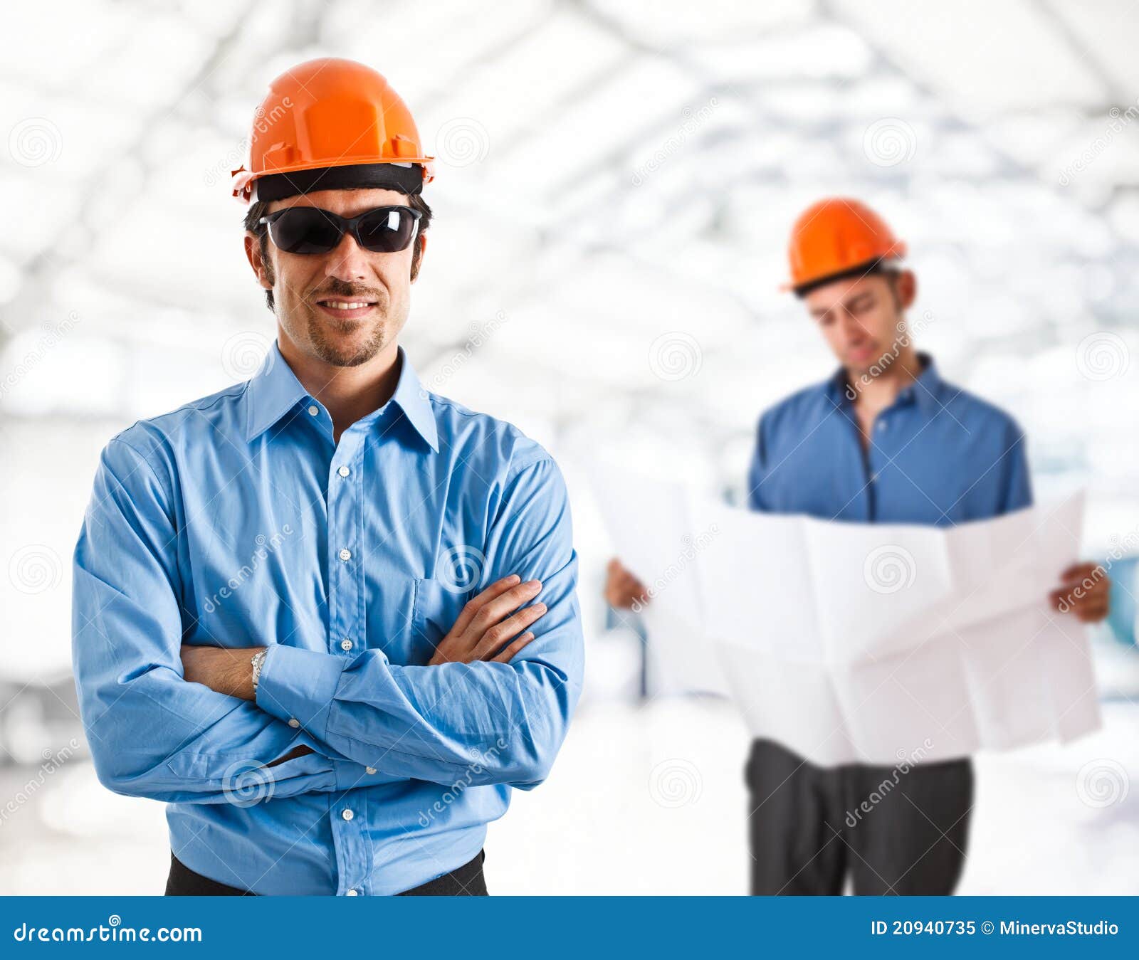 Architects at work stock image. Image of industry, helmet - 20940735