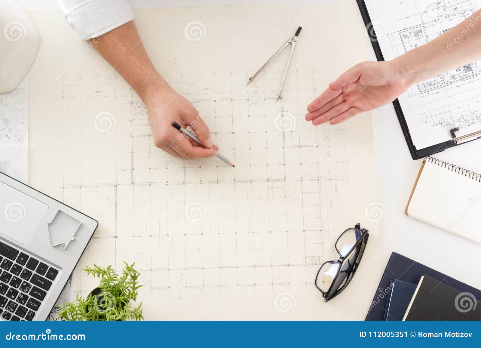 Architects Working on Blueprint, Real Estate Project. Architect ... Architects Working on Blueprint, Real Estate Project. Architect ...