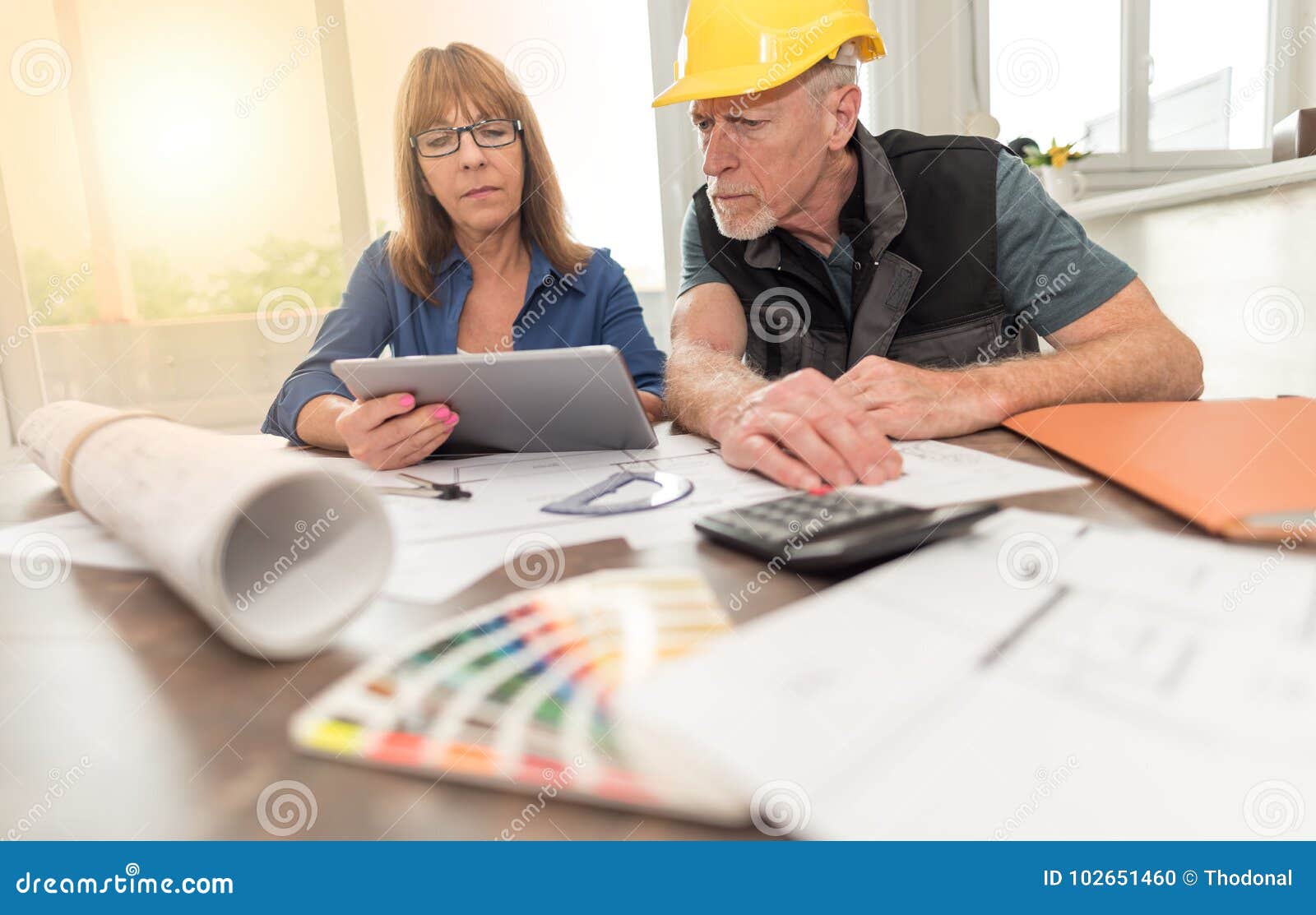Architects Working on Plans, Light Effect Stock Photo - Image of ...