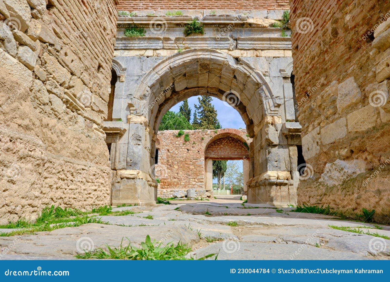 Architectural Arch Made of Red Bricks Wall with Blue Sky Background in ...