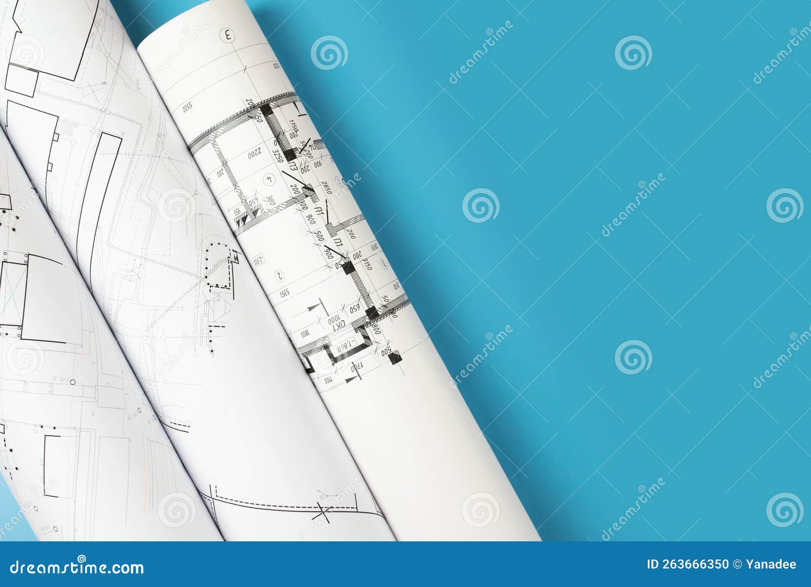 Architectural Blueprint Rolls on a Blue Background, Copy Space Stock ...