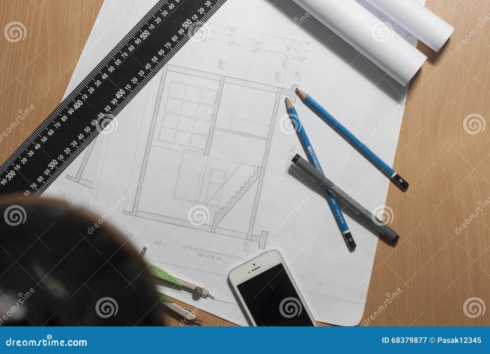 Architectural Blueprints And Blueprint Rolls And A Drawing Instruments ...