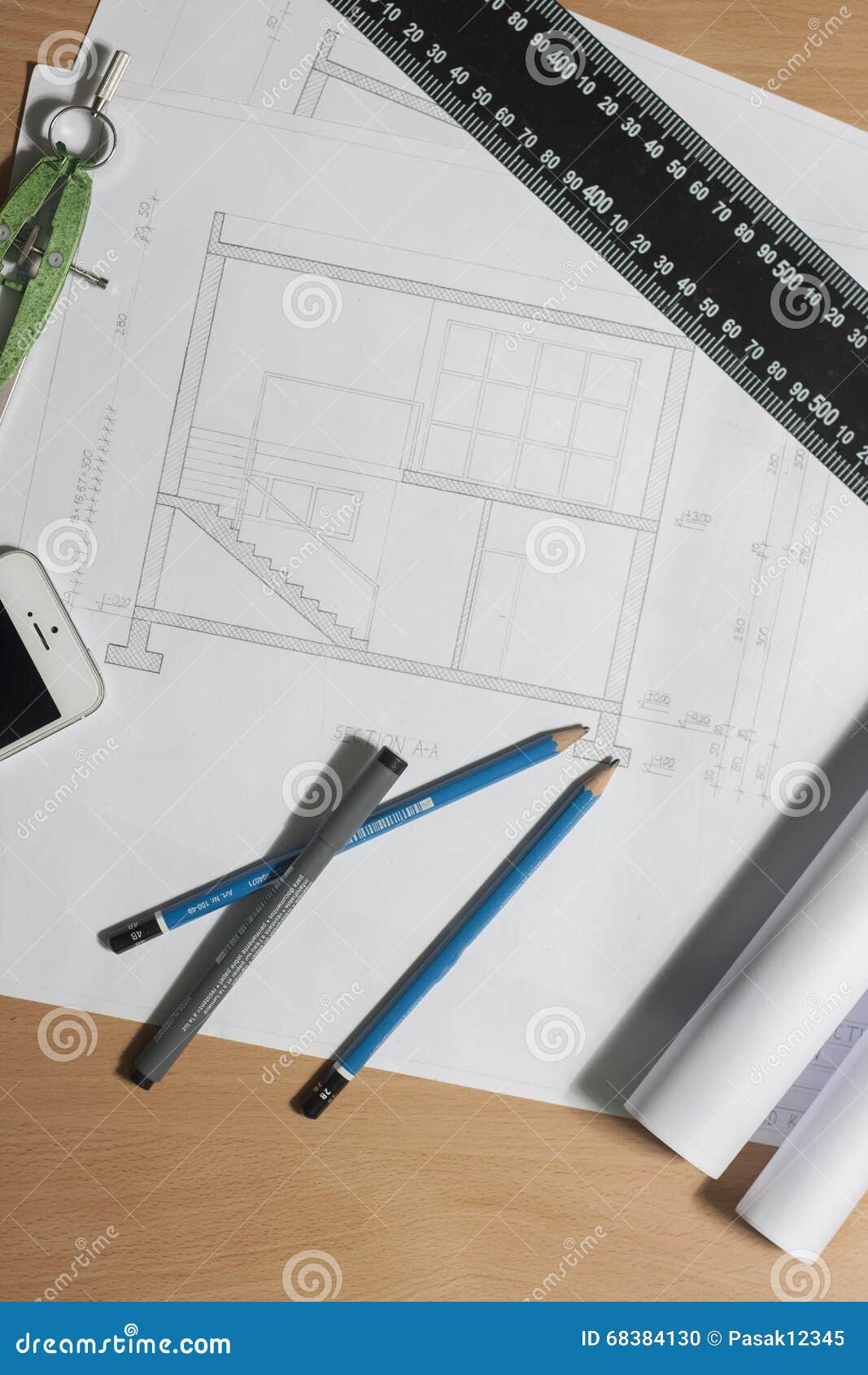 Architectural Blueprints And Blueprint Rolls And A Drawing Instruments ...