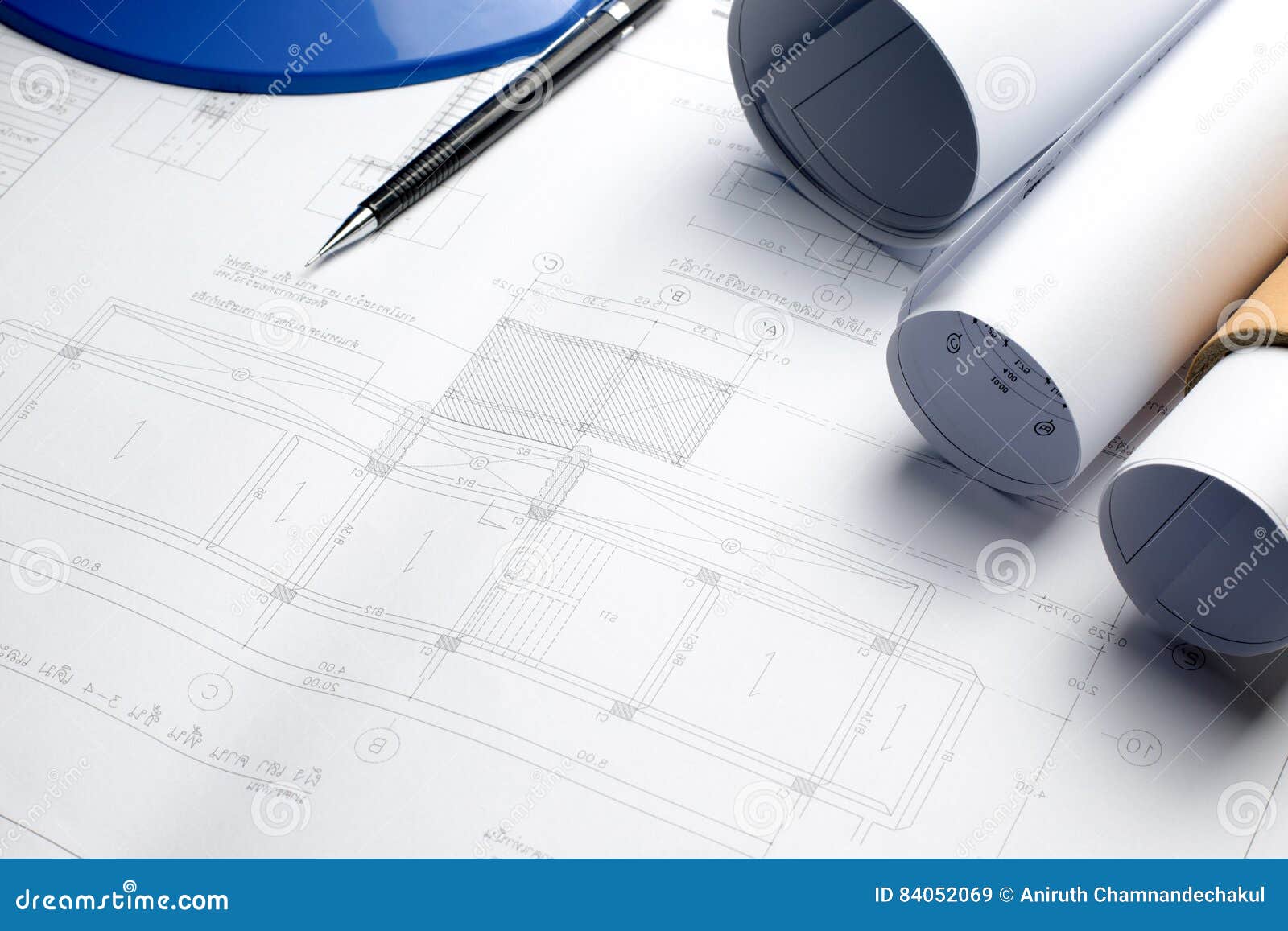 Architectural Blueprints And Blueprint Rolls And A Drawing Instruments ...