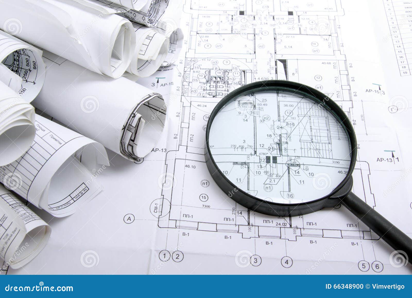 Architectural Blueprints, Blueprint Rolls and Magnifying Glass on White ...