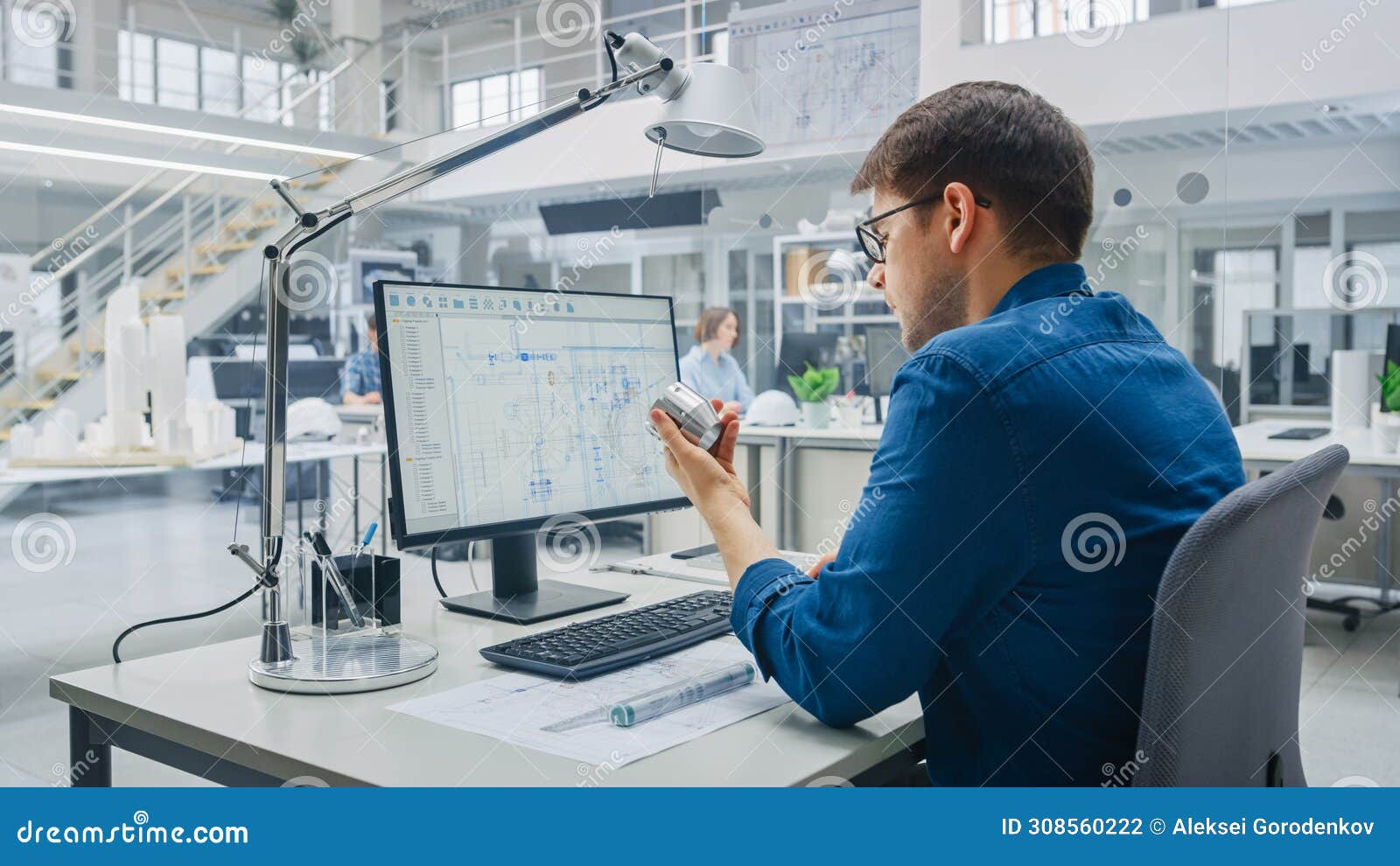 In Architectural Bureau: Team of Architects and Engineers Working on a ...