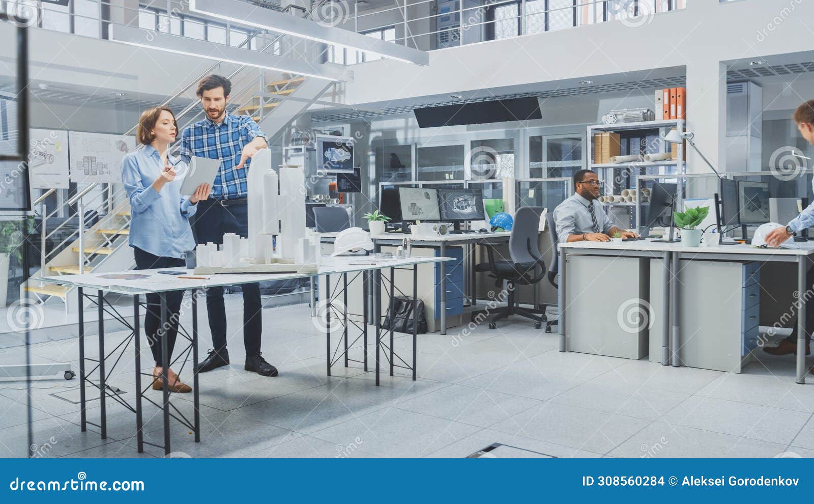 In Architectural Bureau: Team of Architects and Engineers Working on a ...