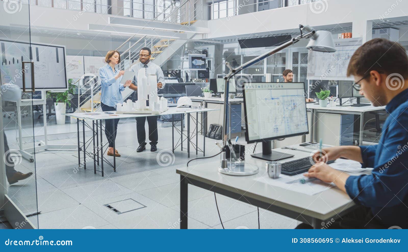 In Architectural Bureau: Team of Architects and Engineers Working on a ...
