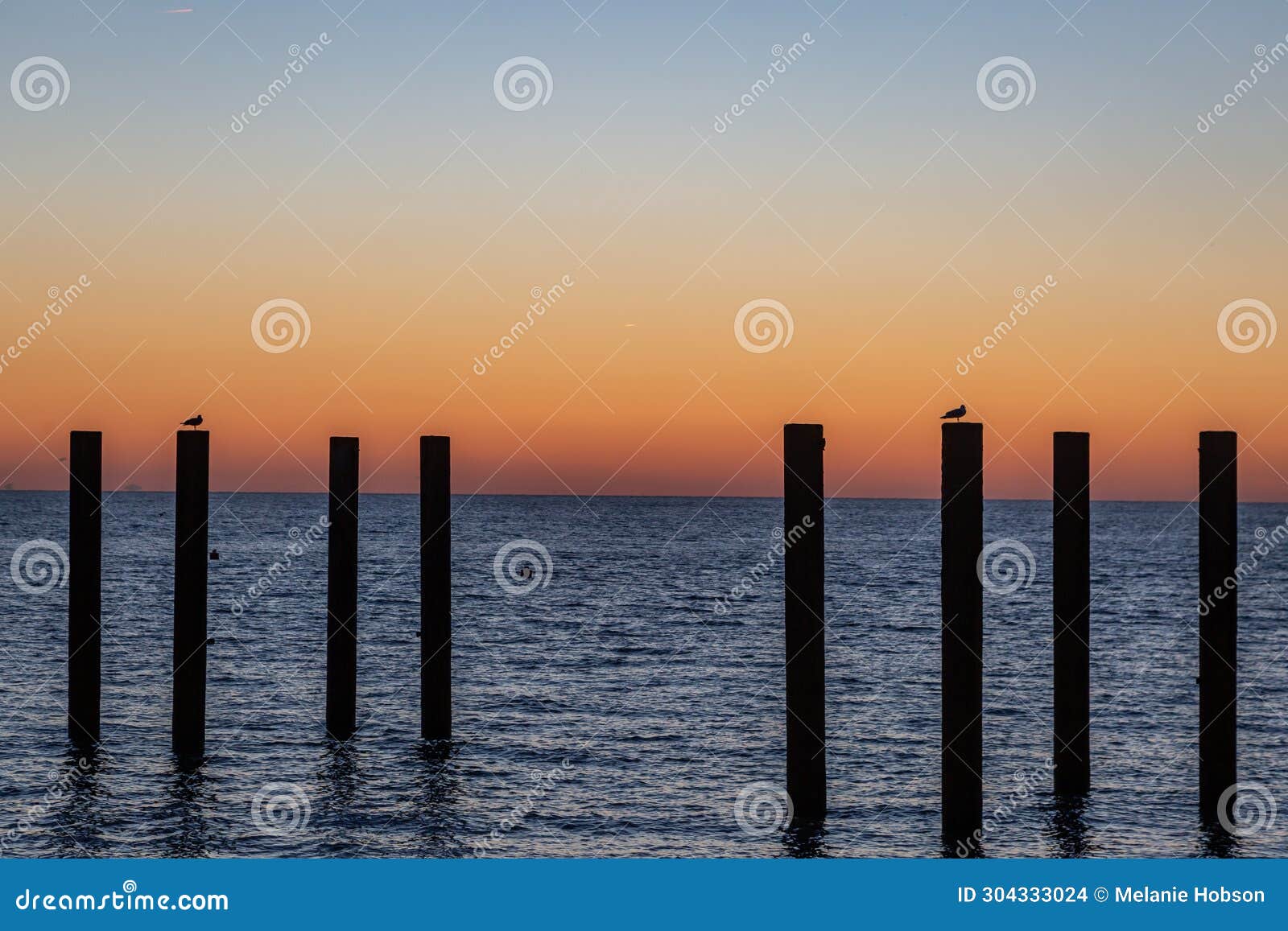 The Architectural Columns of Brighton S West Pier, with a Sunset Sky ...
