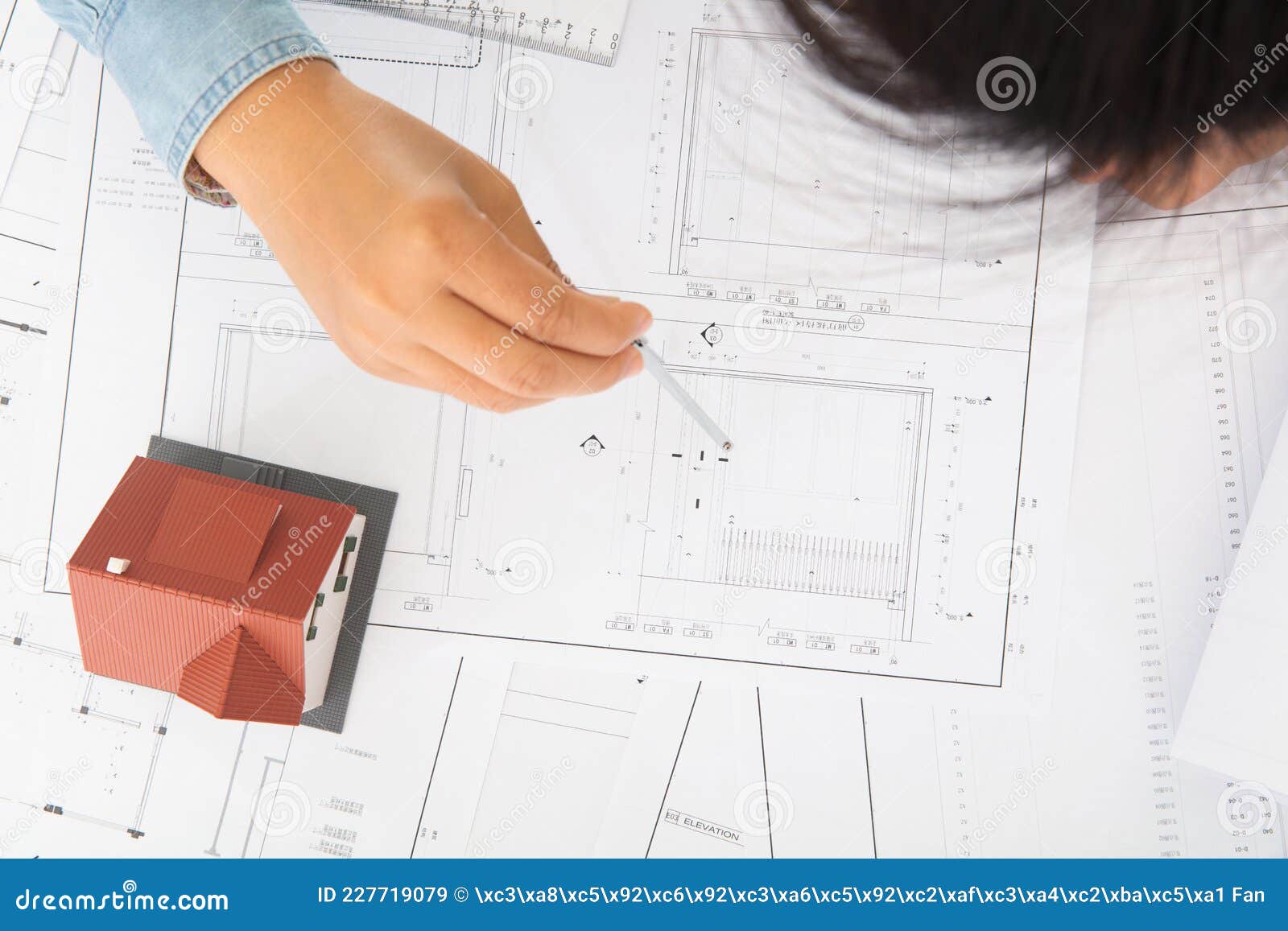 Architectural Design Engineers Check Construction Drawings through ...