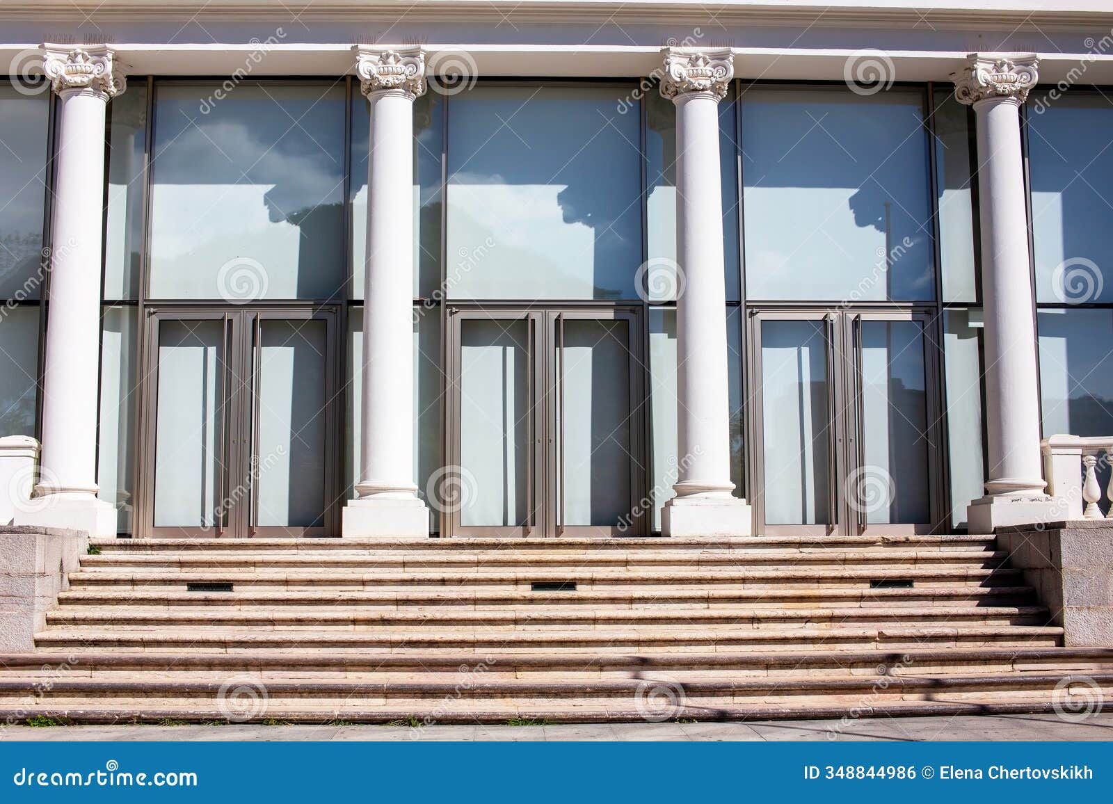 Architectural Detail of a Modern Building with Columns and Glass ...