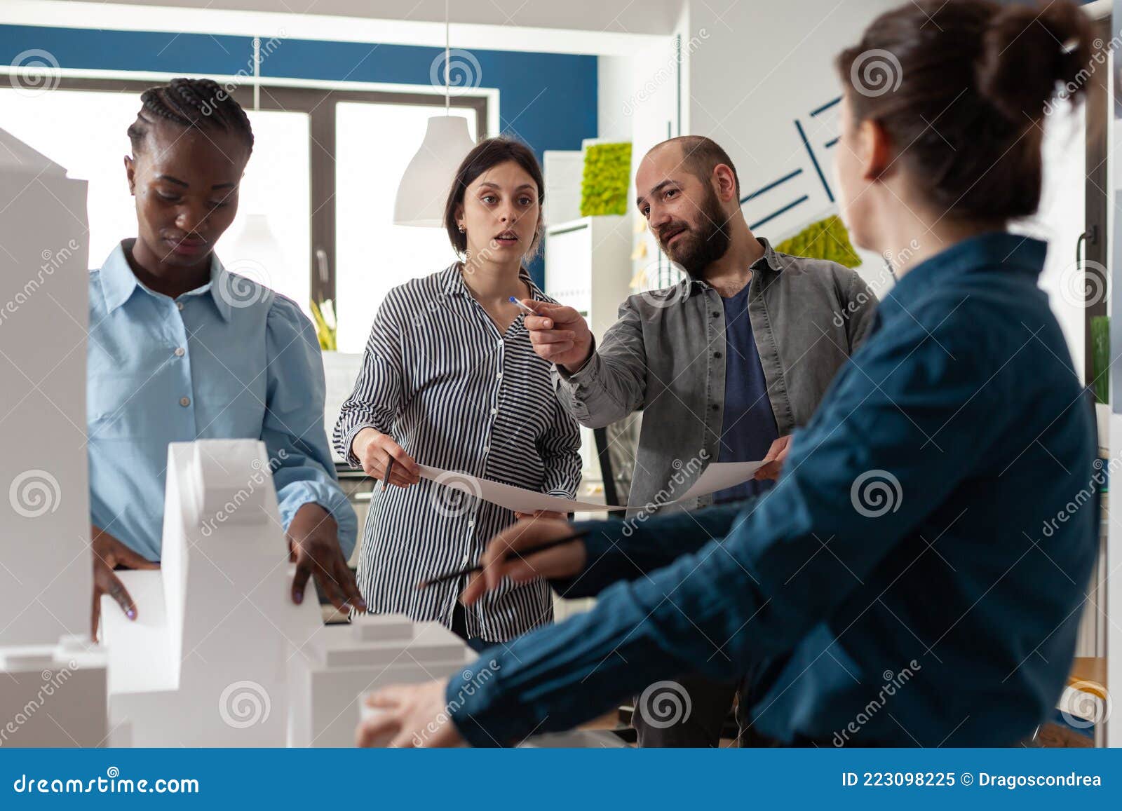 Architectural Diverse Work Group Talking about Project Stock Image ...