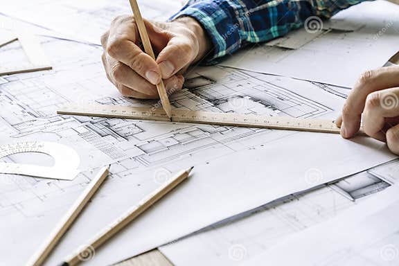 Architectural Engineering Design Plan Drawing on the Table. Architect ...