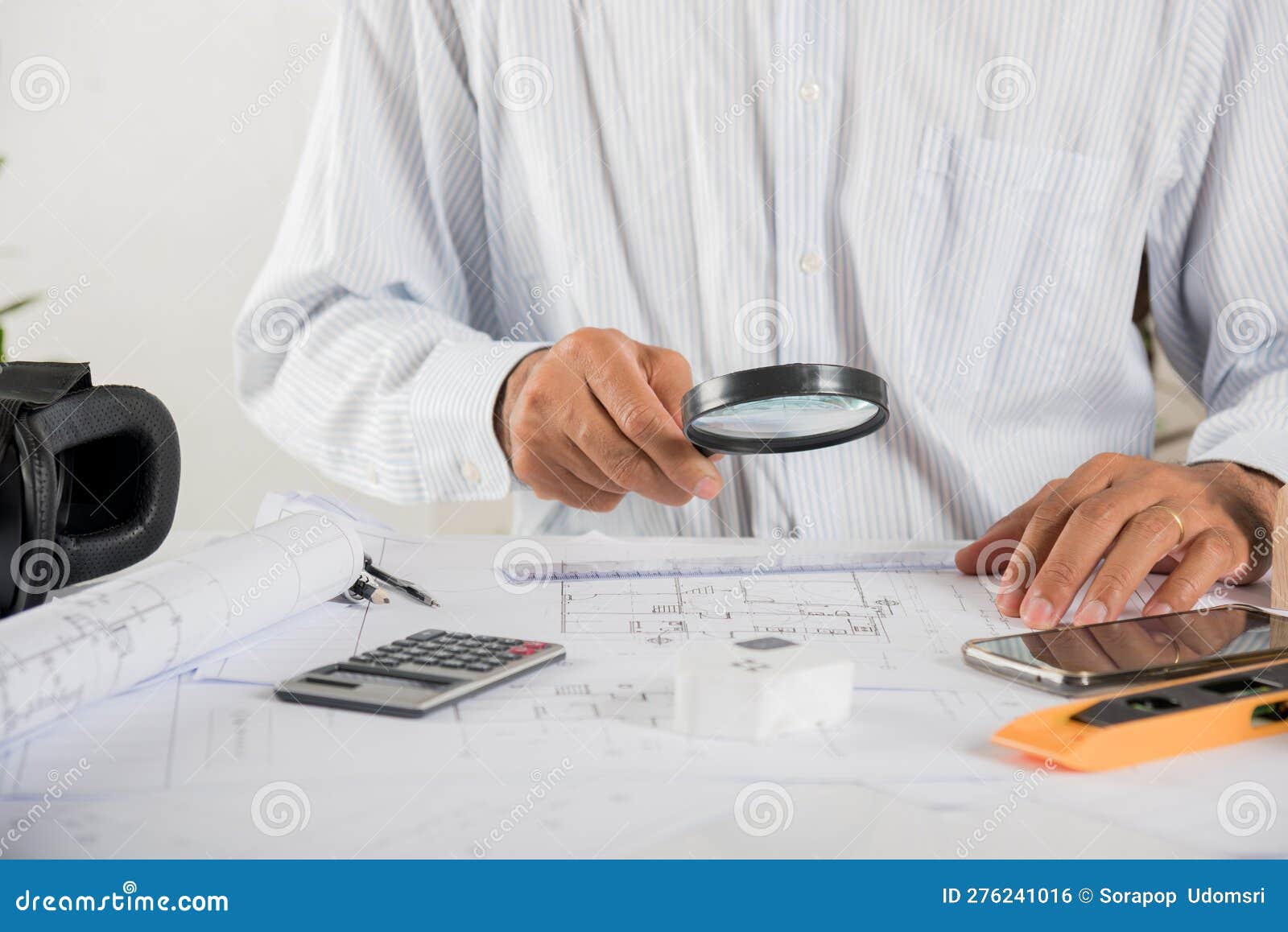 Architectural Interior Designer Working Holding Magnifying Glass and ...