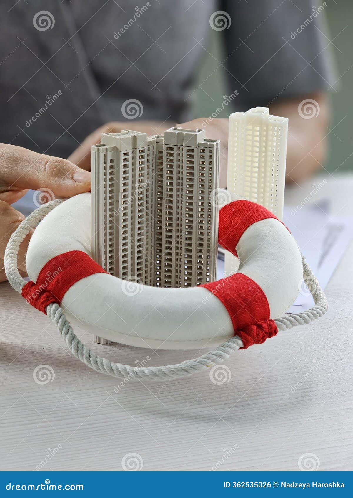 Architectural Models Displayed on a Lifebuoy. Home Insurance Concept ...