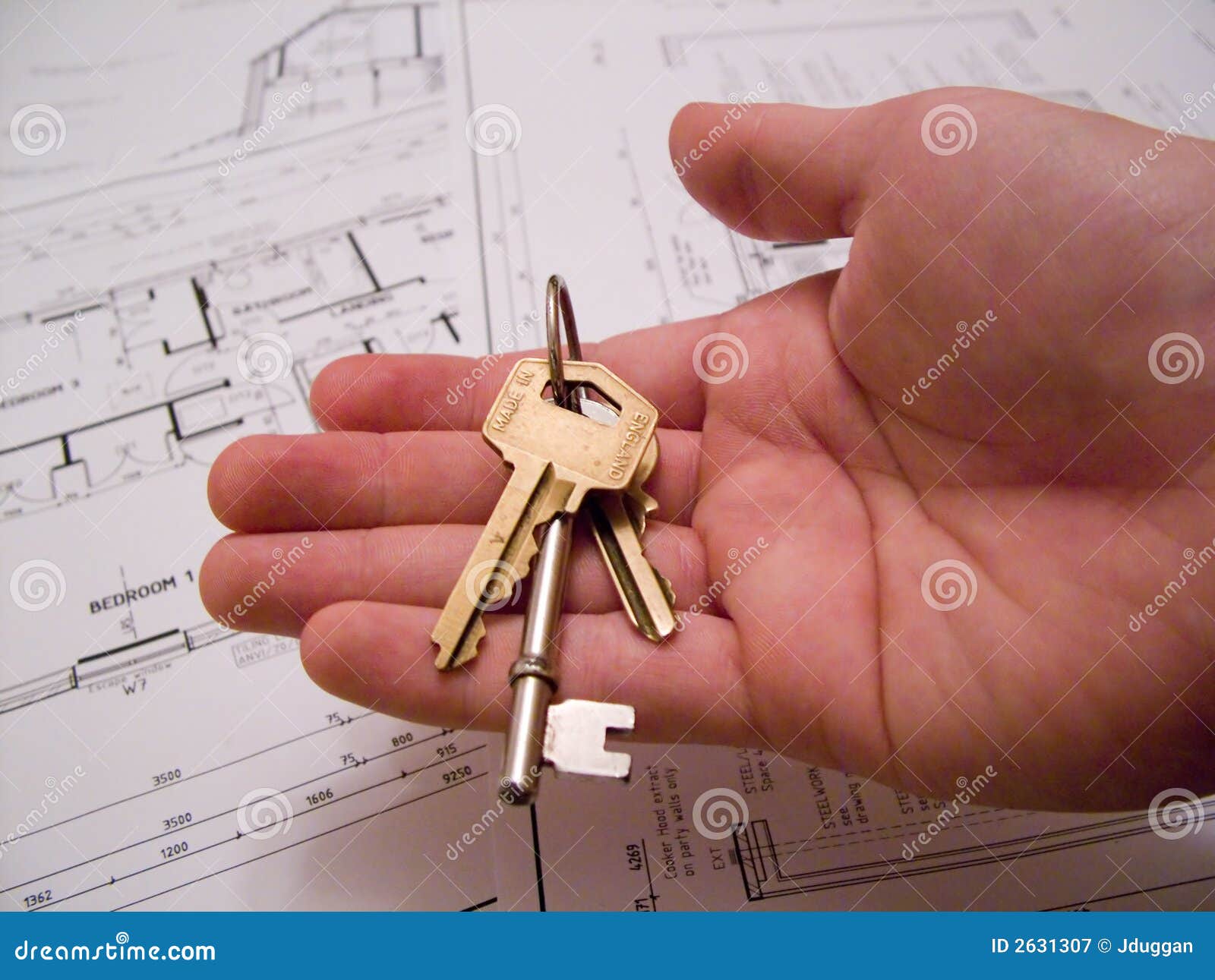 Architectural Plans with Keys Stock Image - Image of holding ...