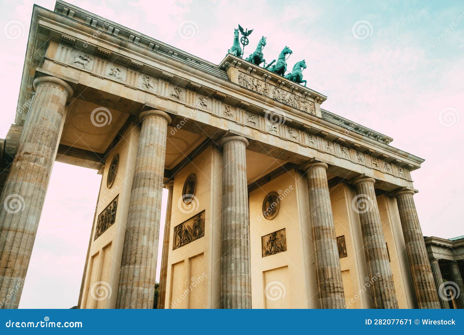 Architectural Structure Featuring Statues Atop Its Grand Height ...