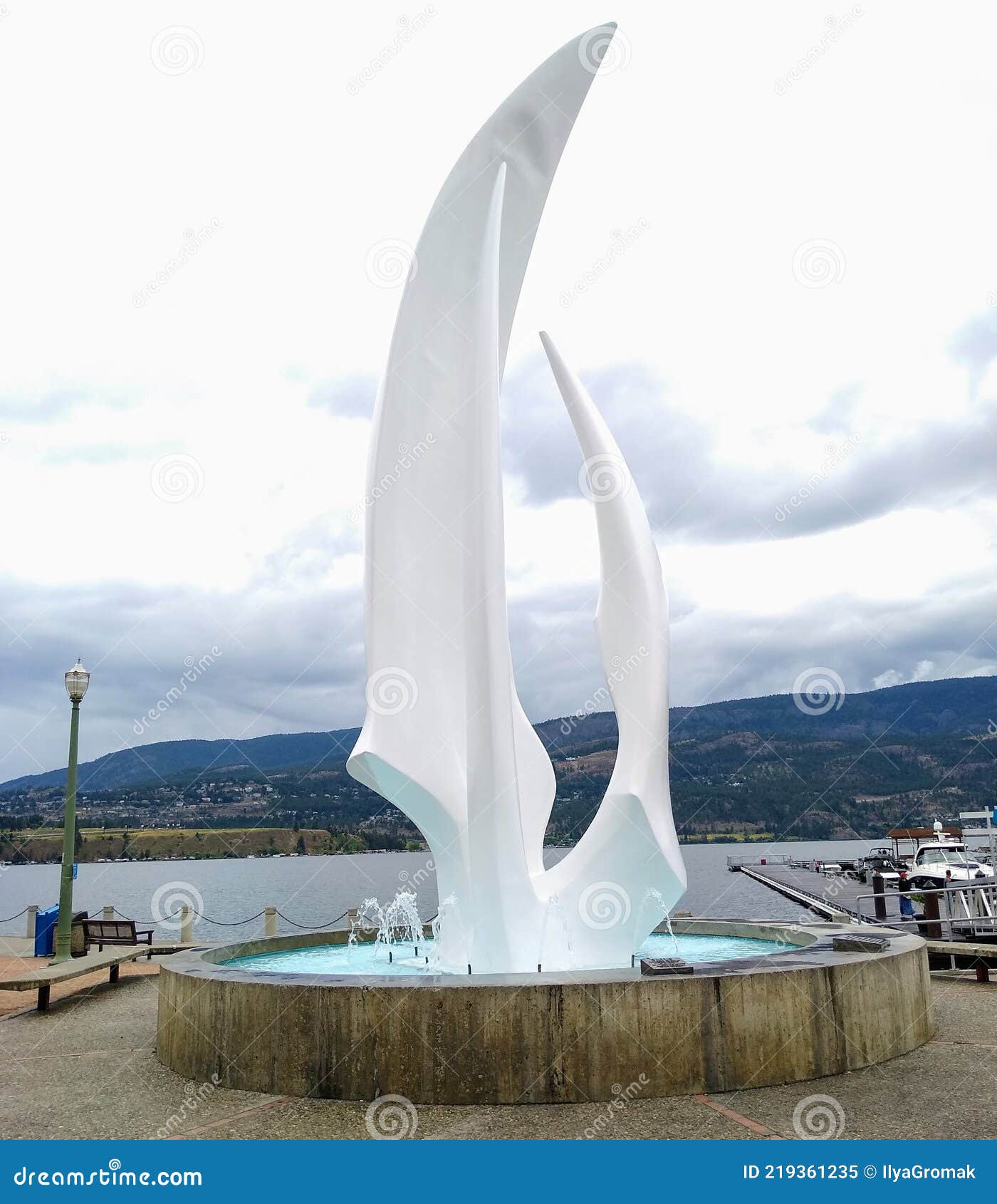 An Architectural Structure in the Form of White, Curved, Tall Elements ...