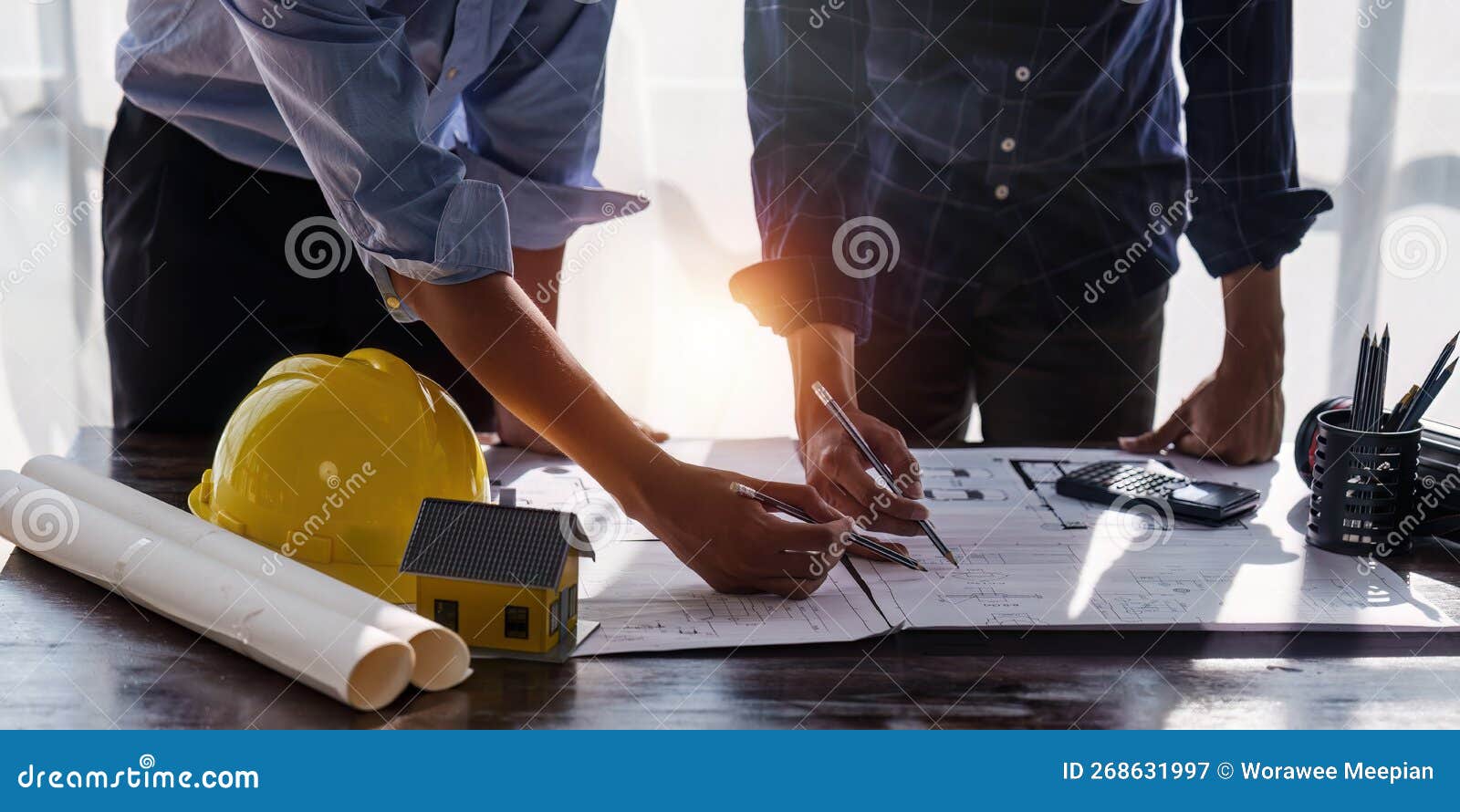 Architecture or Civil Engineer Team Analyze with Construction Blueprint ...