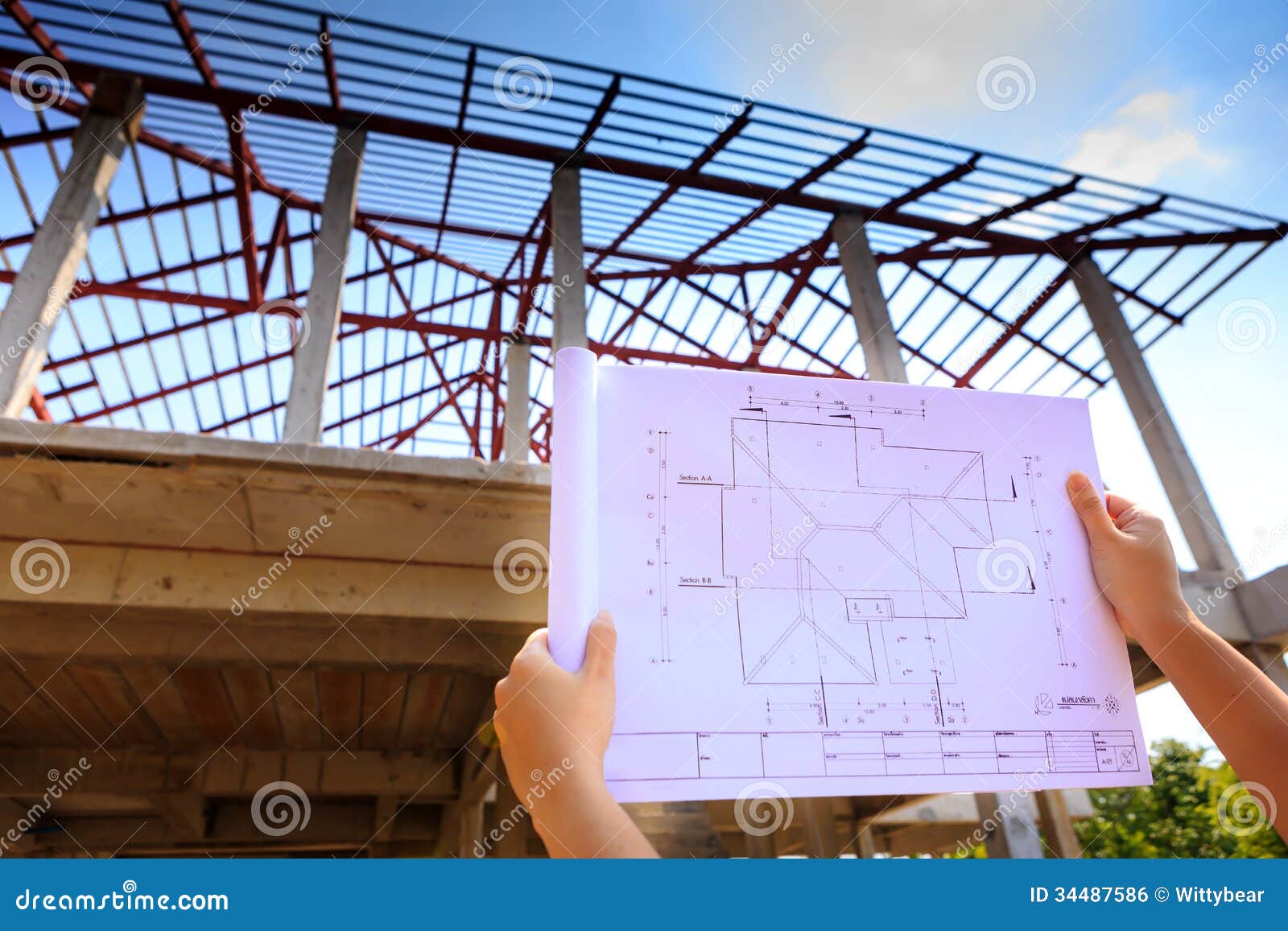 Architecture Drawings in Hand on House Building Stock Photo - Image of ...