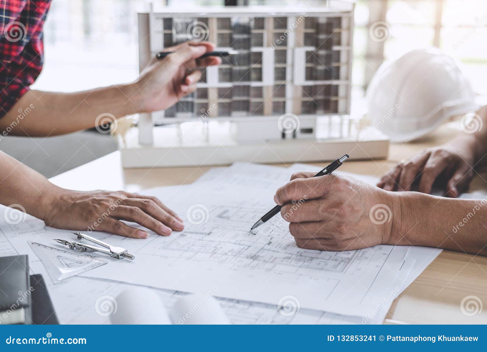 Architecture Engineer Teamwork Meeting, Drawing and Working for Stock ...