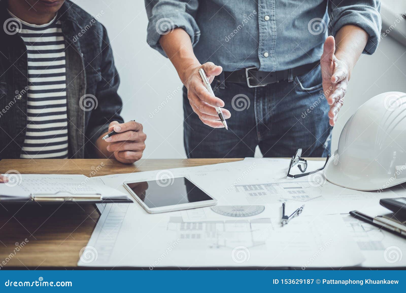 Architecture Engineer Teamwork Meeting, Drawing and Working for ...