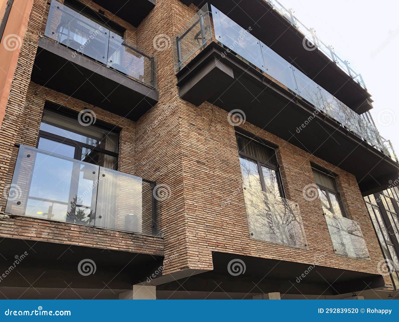 Architecture and Real Estate, Residential Apartment Building with Large ...