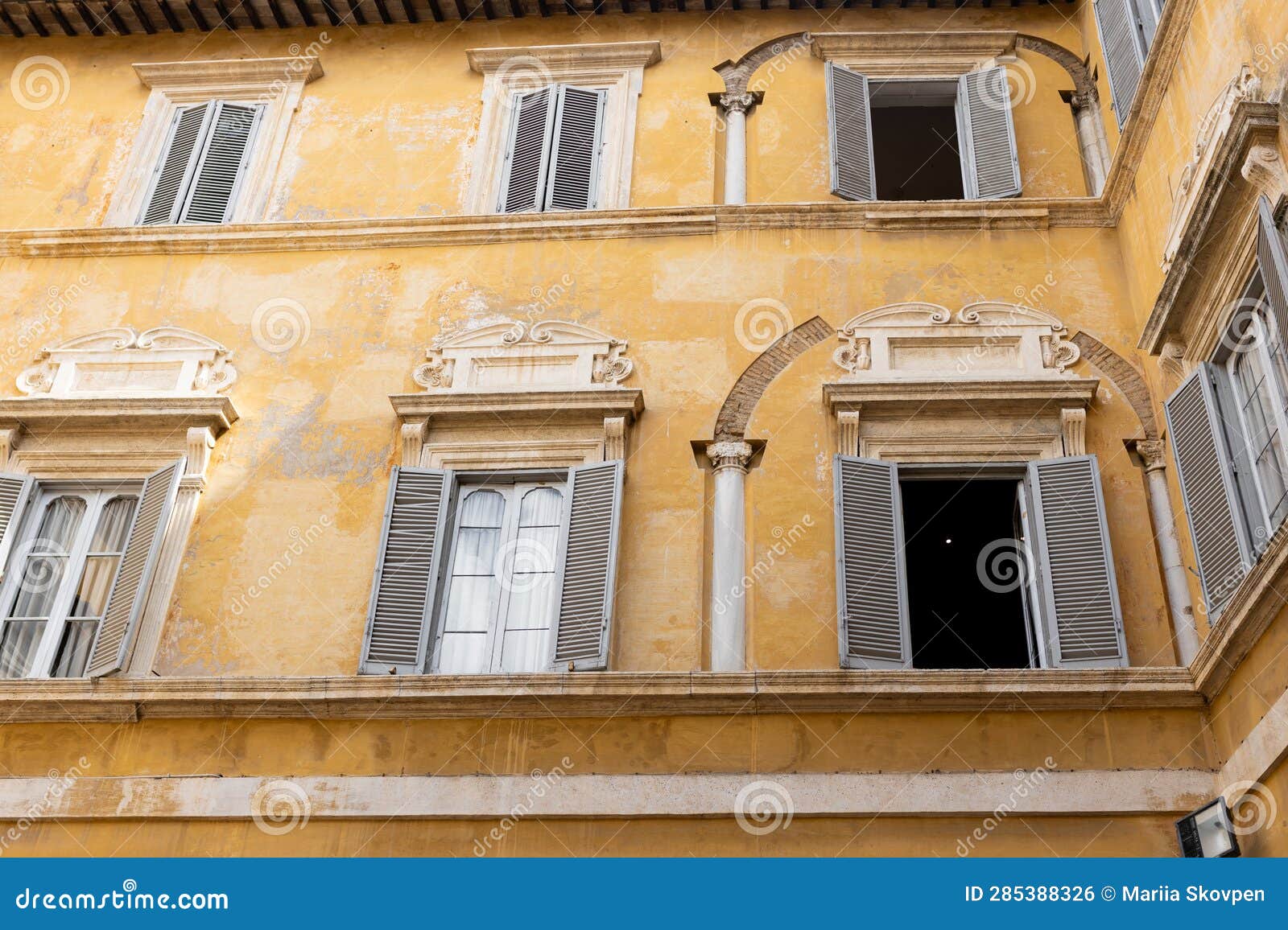 Architecture of Rome. a Building with the Characteristic Facade and Windows. Summer Time Stock ...