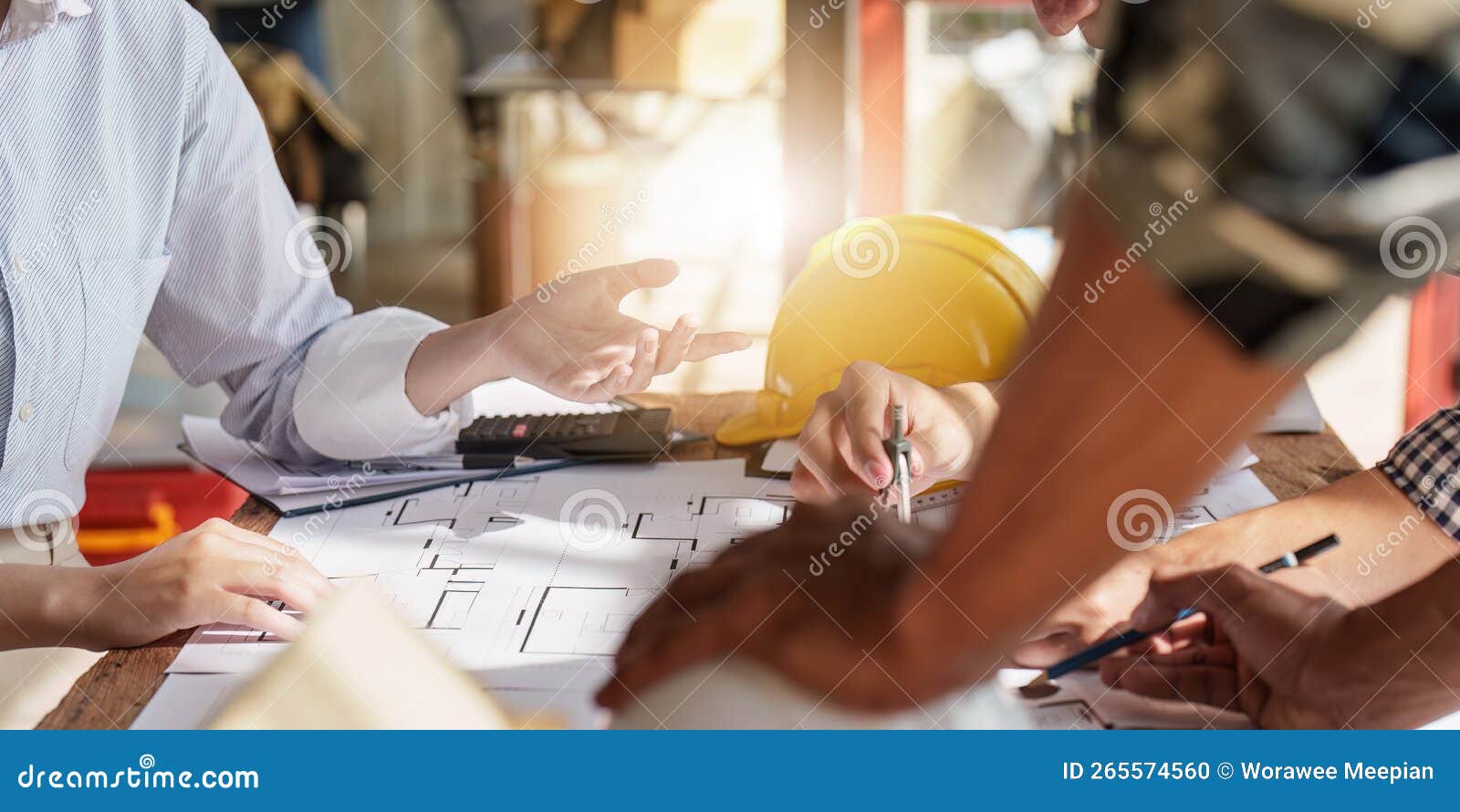 Architecture Team Drawing Something while Working with Blueprint in the ...