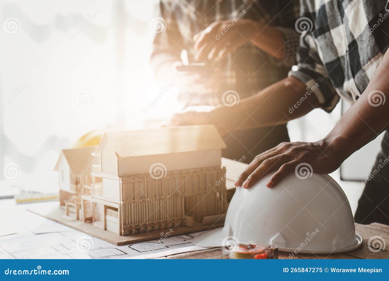 Architecture Team Drawing Something while Working with Blueprint in the ...