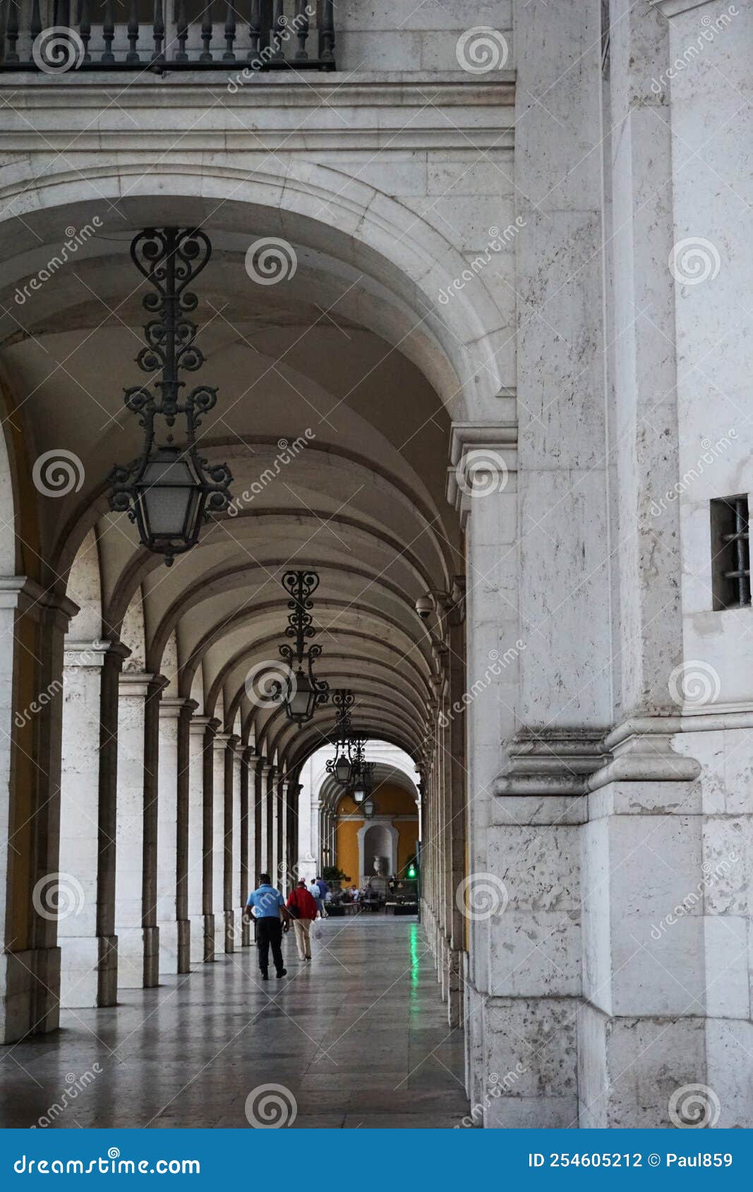 Arches in Central Lisbon with People Walking in the Distance Editorial ...