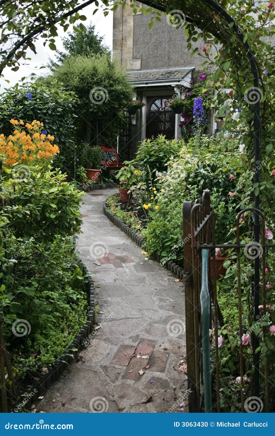 Archway into the garden stock photo. Image of walkway - 3063430