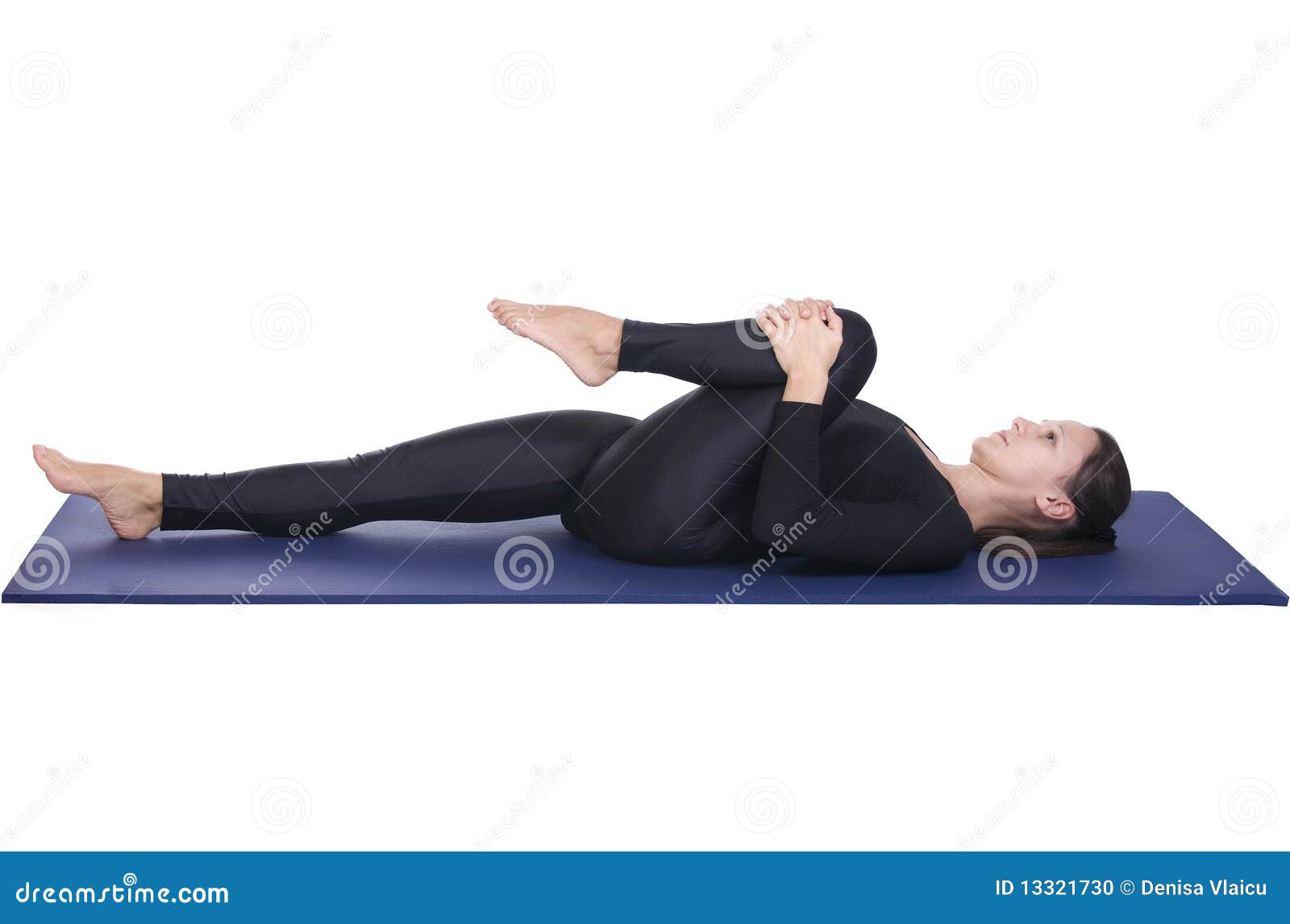 Ardha Pavana Muktasana stock photo. Image of pilates - 13321730